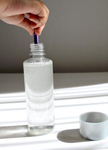 Science Sensory Bottles for Density Exploration with Crayons